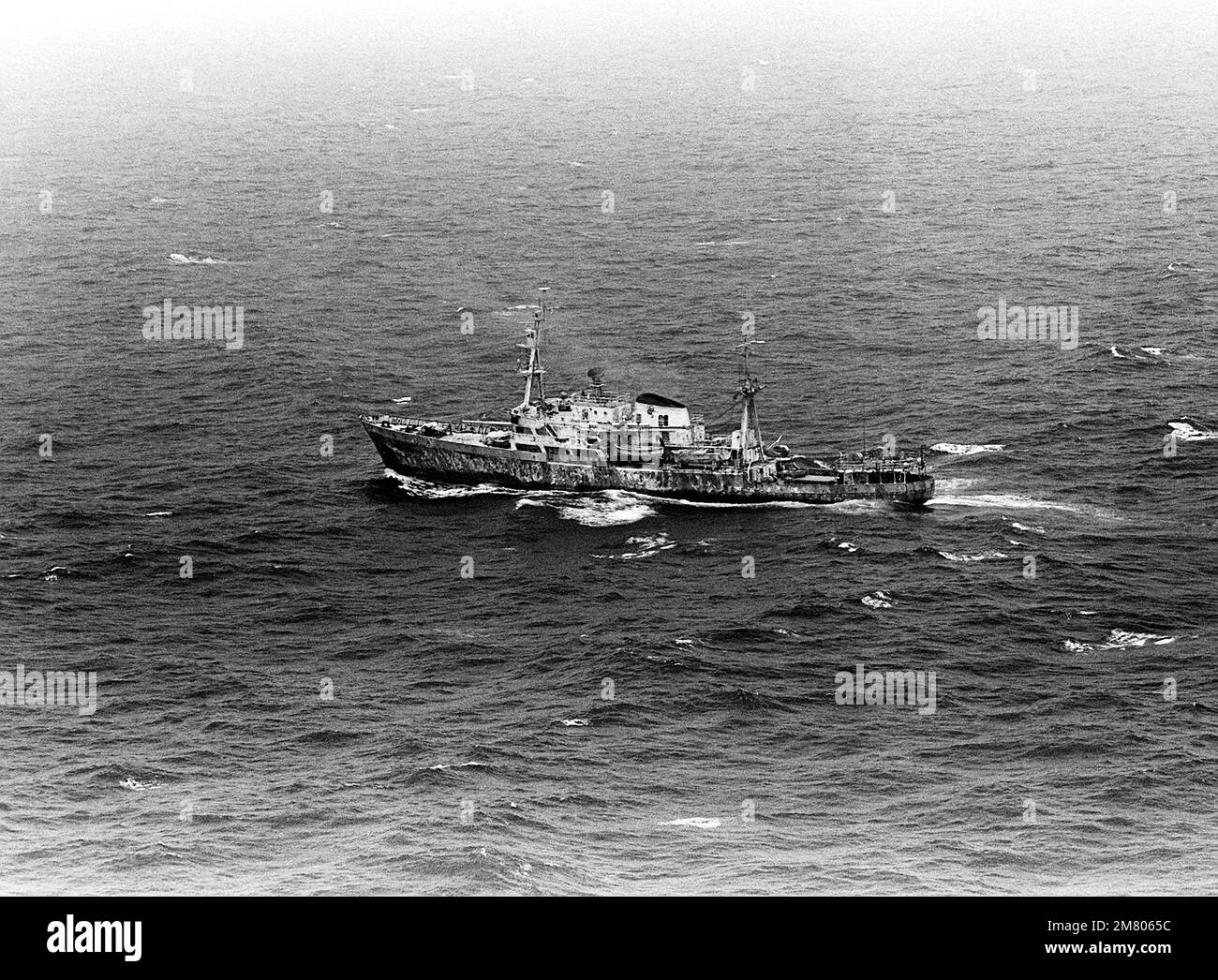 An aerial port beam view of a Soviet intelligence collector ship (AGI ...