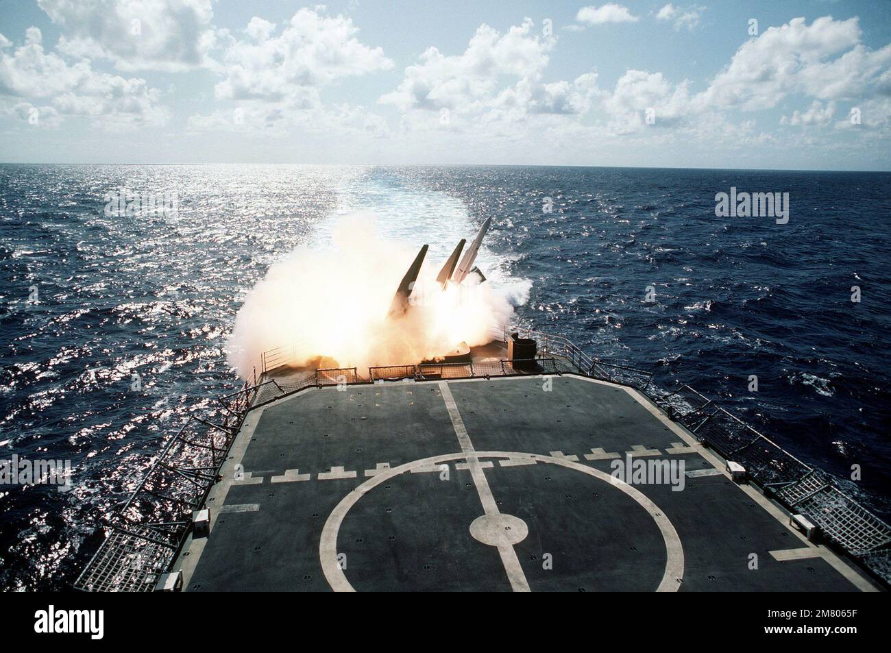 A view of a missile being fired from the aft launcher aboard the guided ...