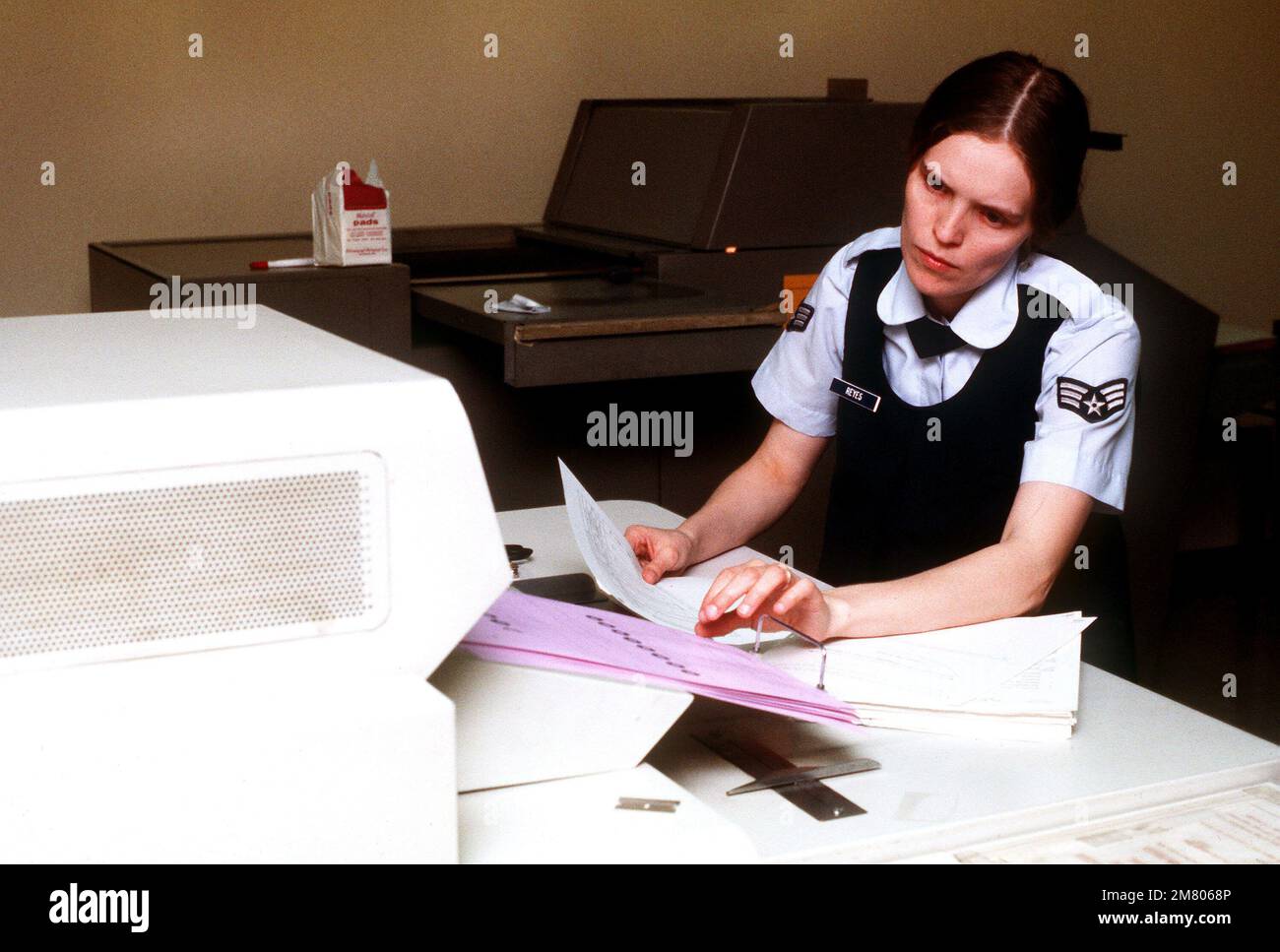 Sergeant Barbara Reyes, 475th Air Base Wing reprographics shop, makes ...