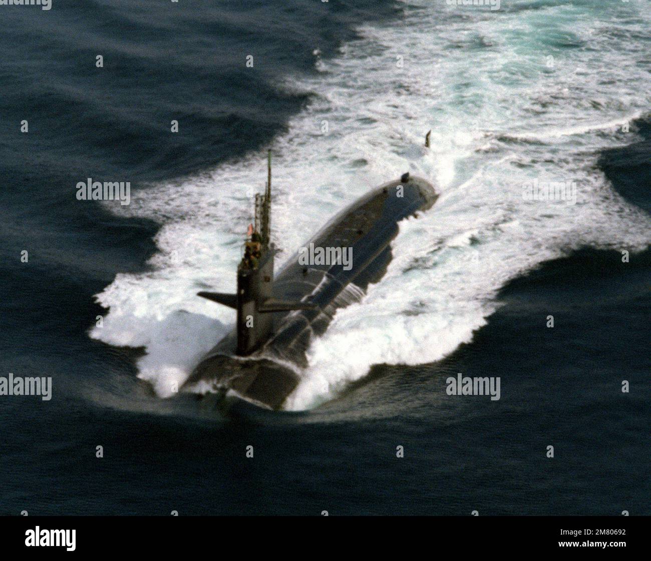 An aerial port bow view of a Sturgeon class nuclear-powered attack ...