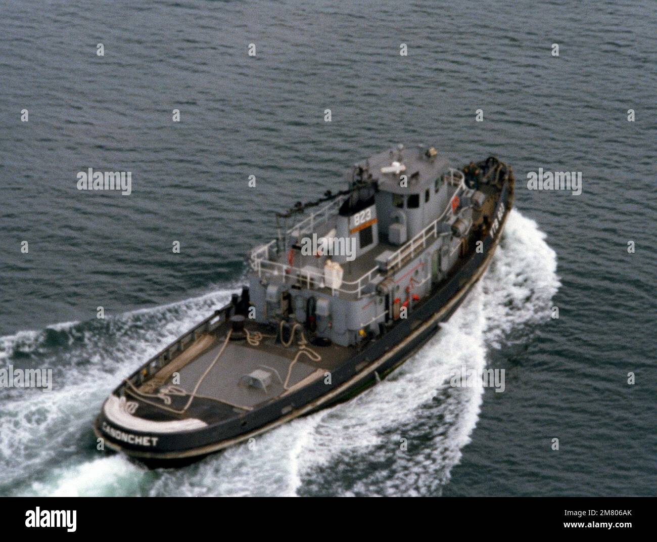 An aerial starboard quarter view of the large harbor tug CANONCHET (YTB ...