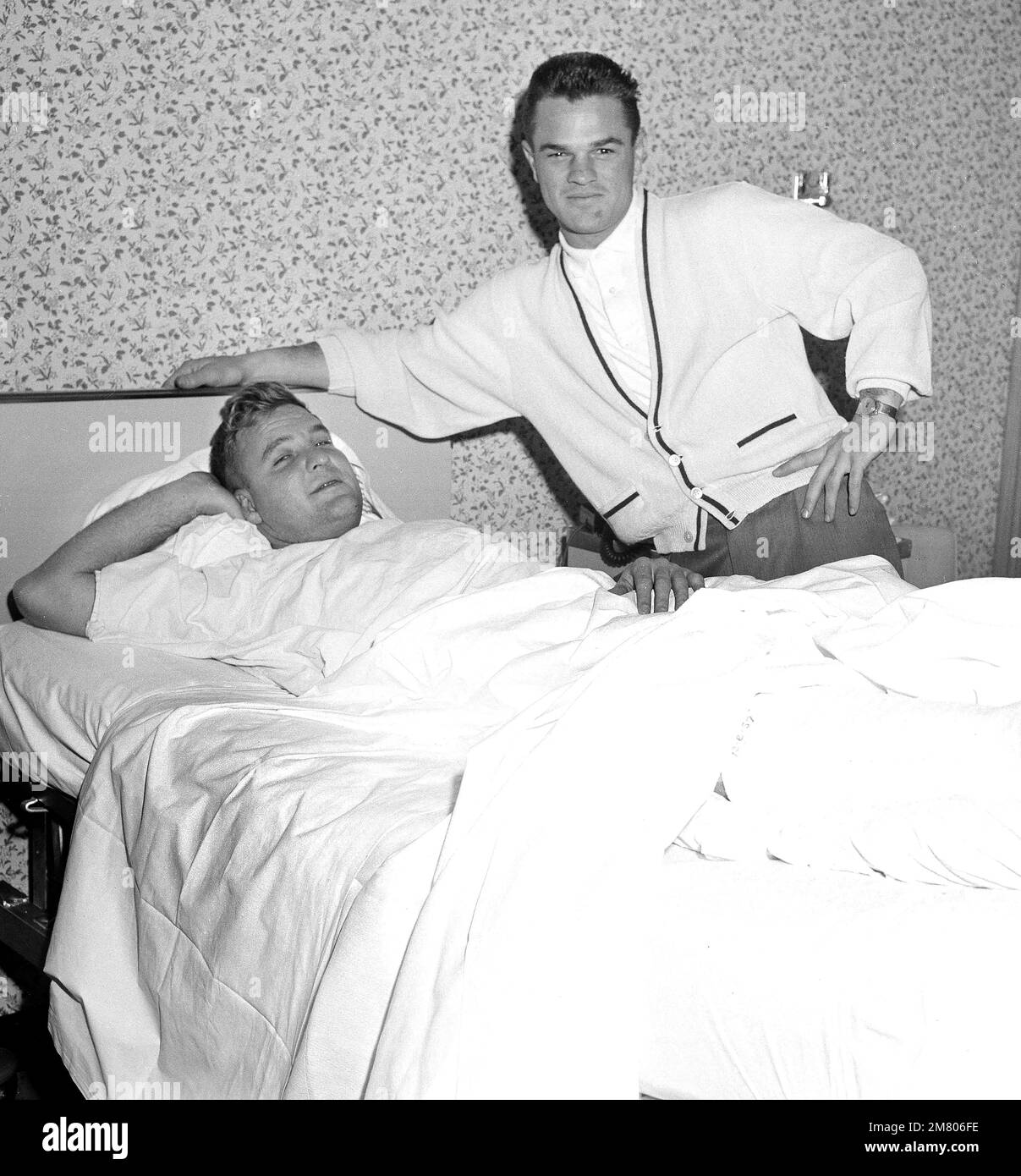 Detroit Lions quarterback Bobby Layne, in bed, who suffered a broken ...