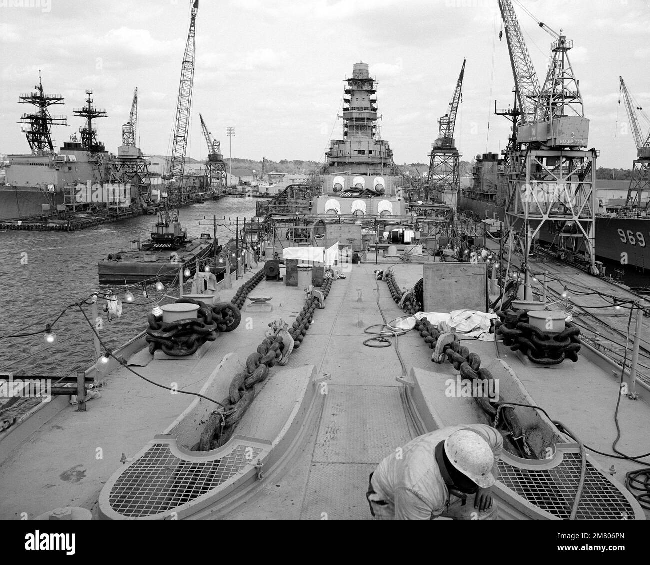 An aerial starboard bow view of the battleship USS IOWA (BB-61) being ...
