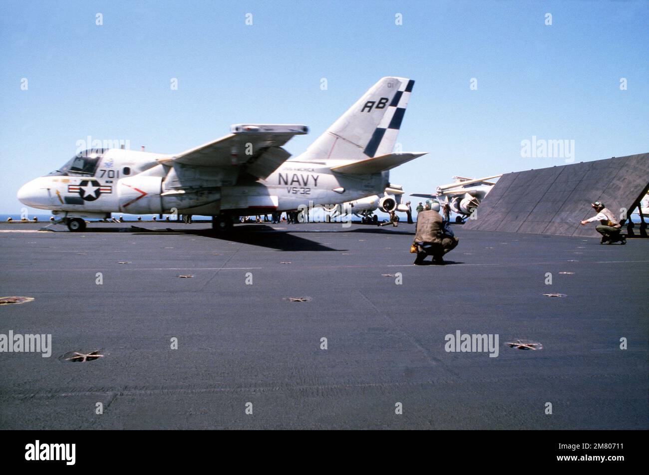 A left side view of an S-3 Viking aircraft on the flight deck of the ...