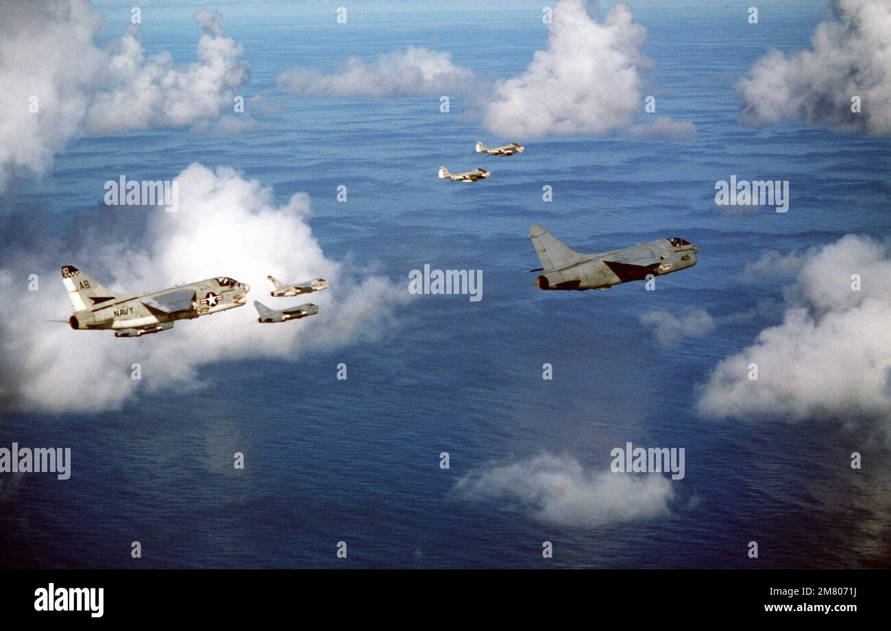 An air-to-air right side view of A-7 Corsair and A-6 Intruder aircraft ...