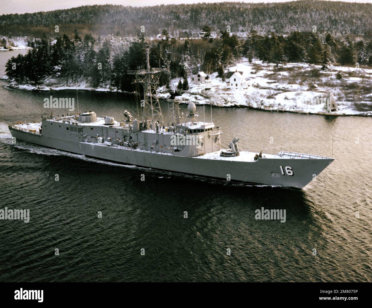 An aerial starboard bow view of the guided missile frigate USS CLIFTON ...