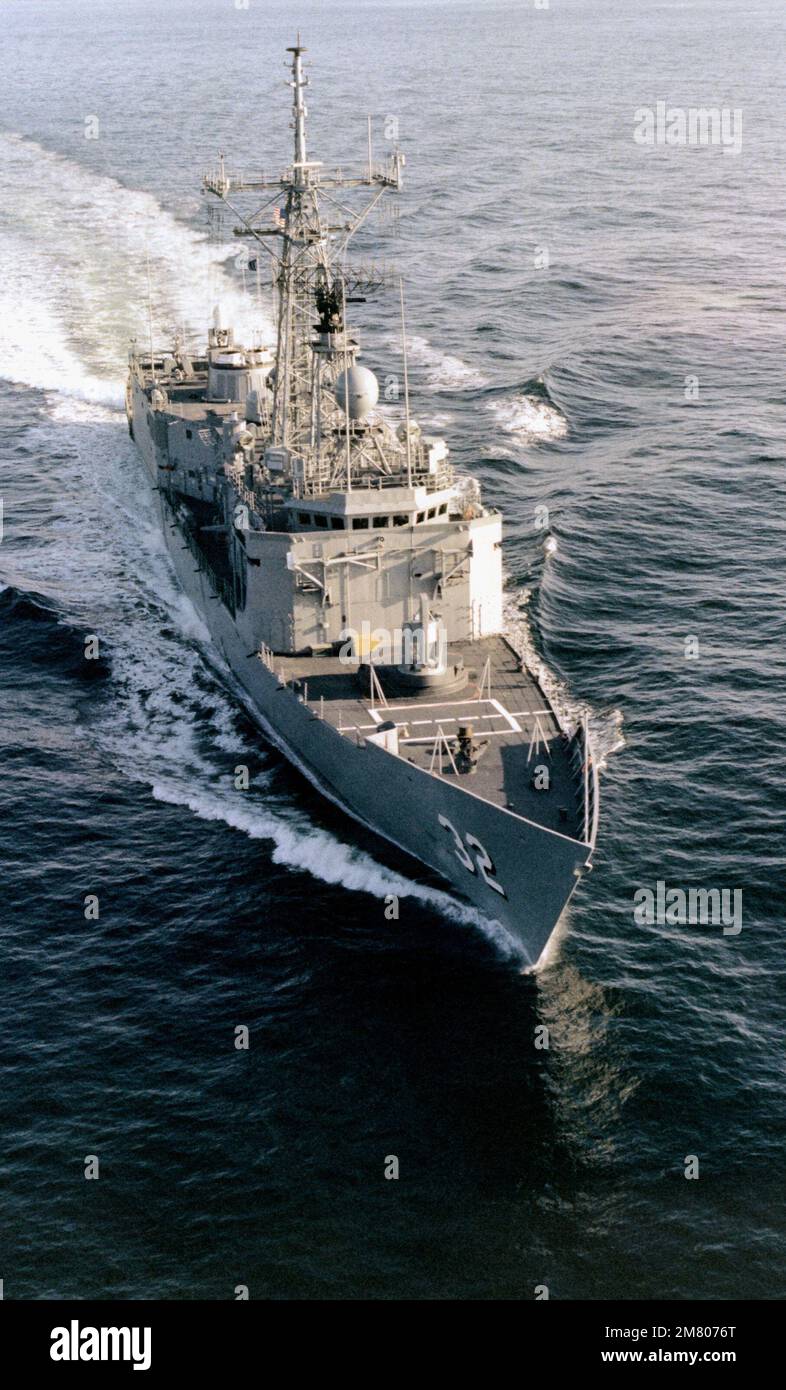 An aerial starboard bow view of the guided missile frigate USS JOHN L ...