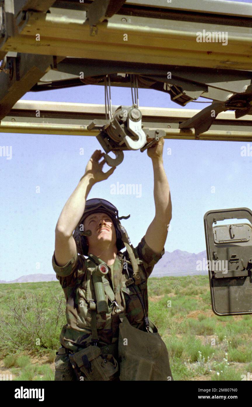 A member of the 3rd Bn., 6th Field Arty., 1ST Infantry Div., prepares a ...
