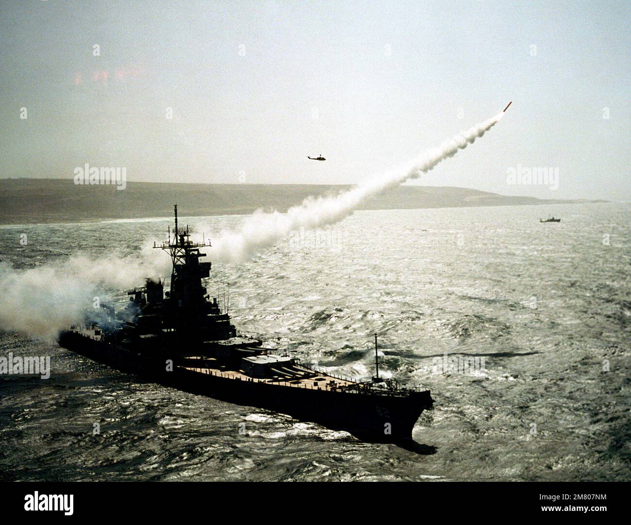 An aerial starboard bow view of the USS NEW JERSEY (BB-62), during the ...