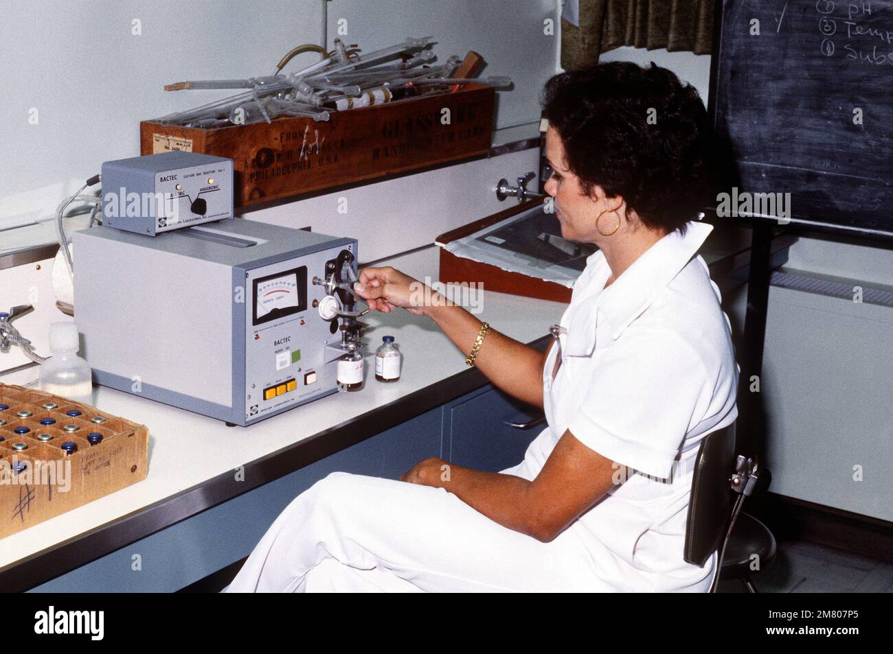 A lab technician tests blood cultures at Gorgas Army Hospital. Base ...