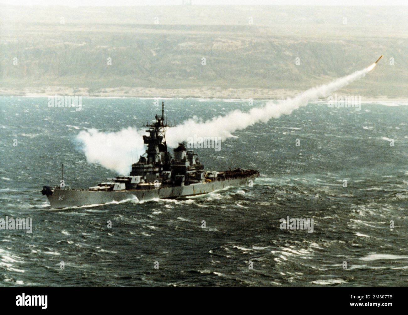 An aerial port bow view of the USS NEW JERSEY (BB-62), during the ...