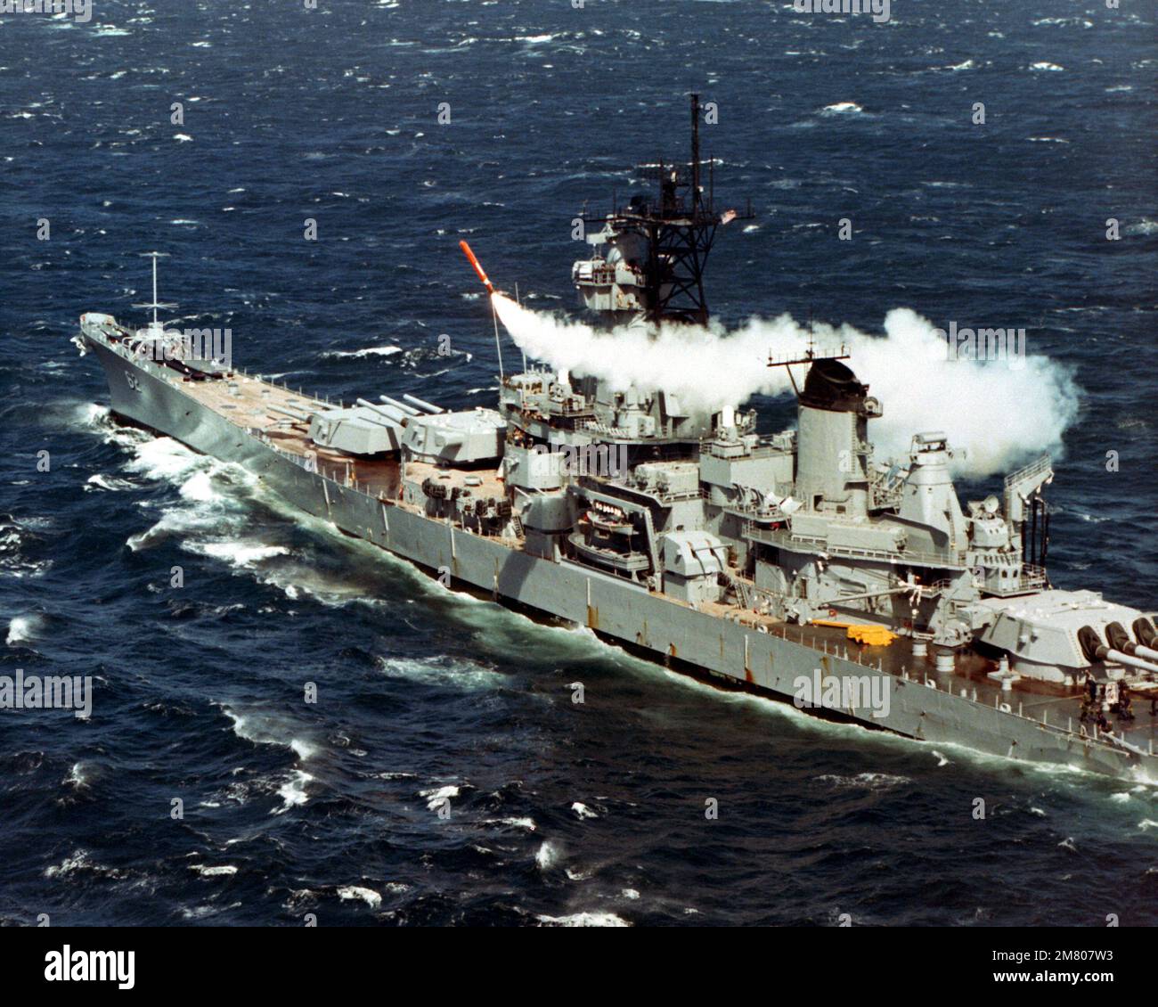 An aerial port quarter view of the USS NEW JERSEY (BB-62), during ...