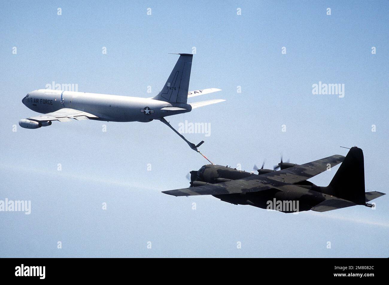 Left side air-to-air view of a KC-135 Stratotanker aircraft from the ...