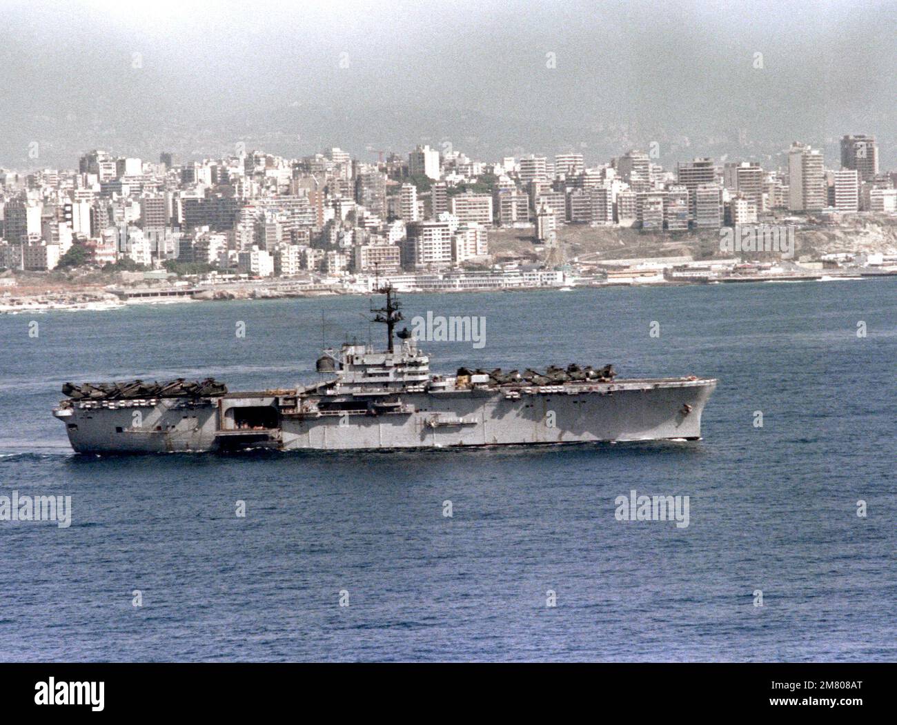 An aerial starboard beam view of the amphibious assault ship USS ...