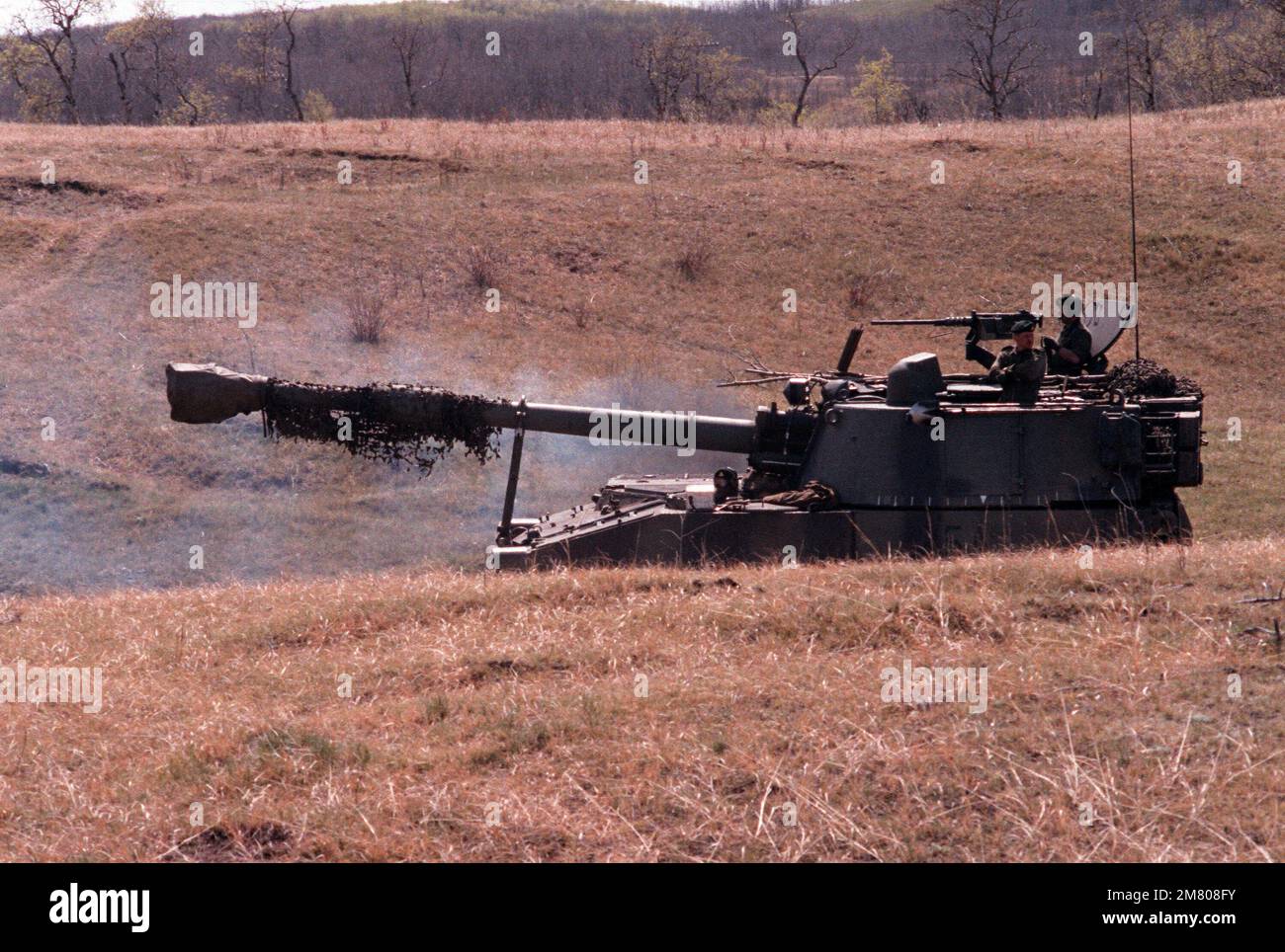 A Canadian army M-109A1 155 mm self-propelled howitzer moves into ...