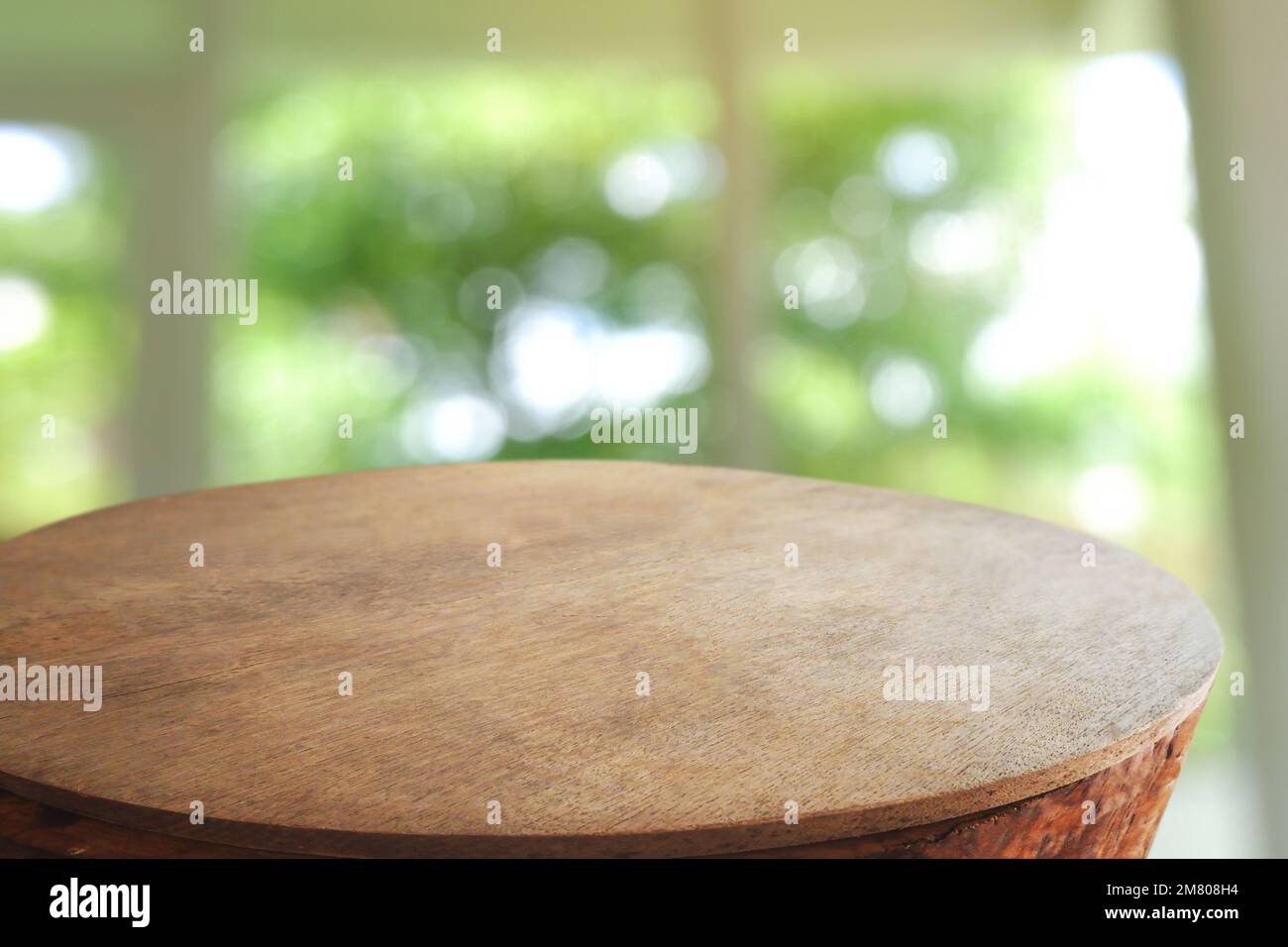 Empty wooden table in front of abstract blurred Cafe, restaurant at ...