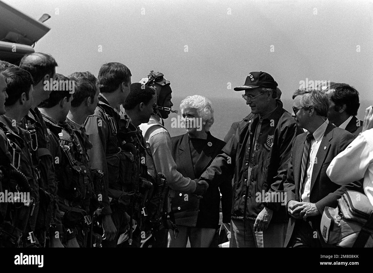 Vice President George Bush talks informally to crewmen during his visit ...