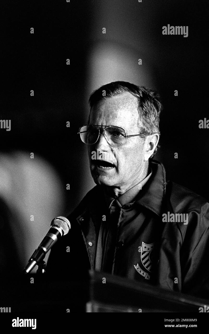 Vice President George Bush speaks to crewmen during a visit aboard the ...