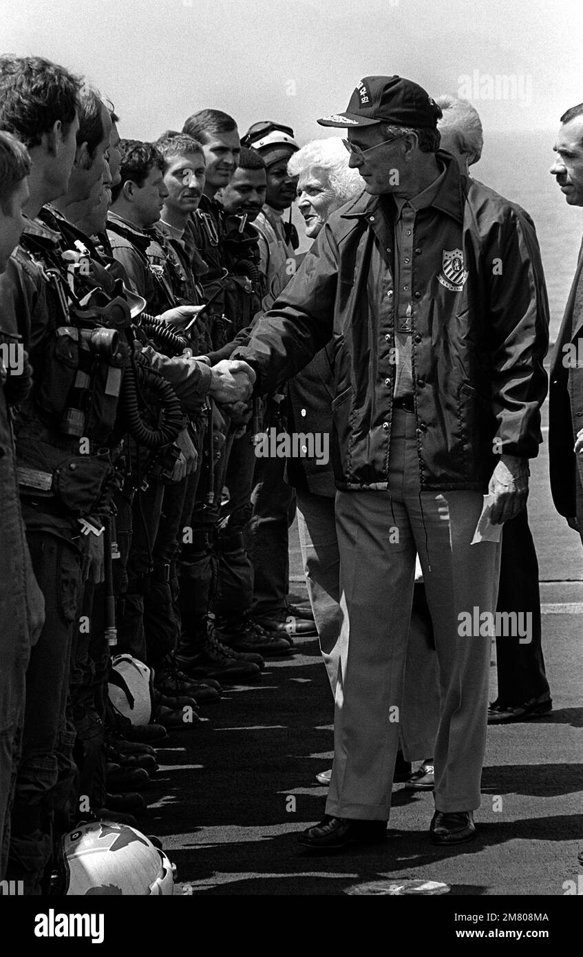 Vice President George Bush congratulates pilots who participated in an ...
