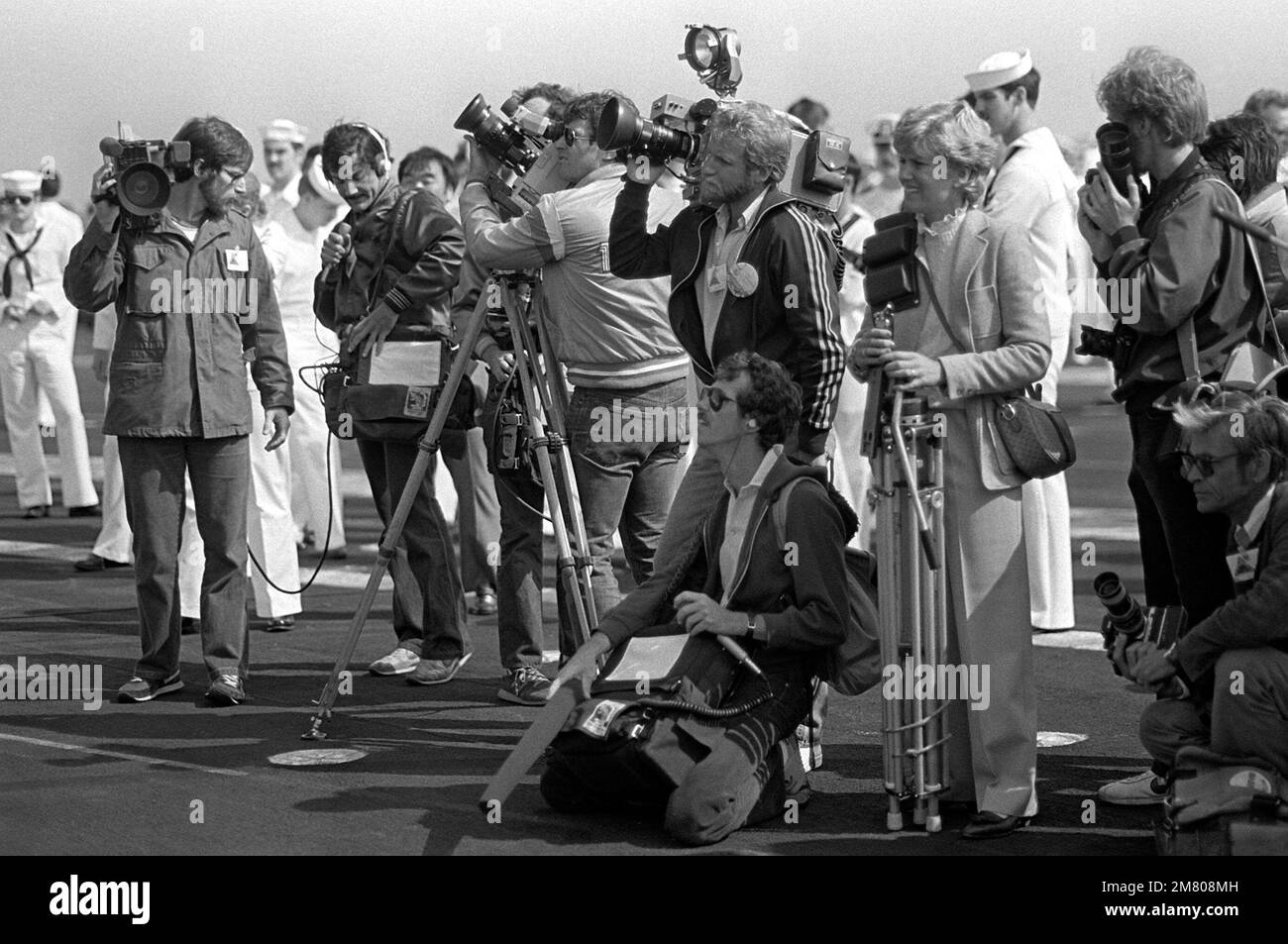 Members of the press corps watch an aerial demonstration during Vice ...