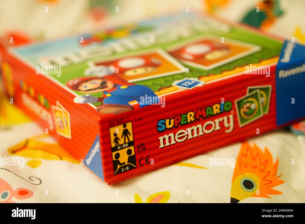 A closeup shot of Ravensburger brand Super Mario Memory card game in a ...