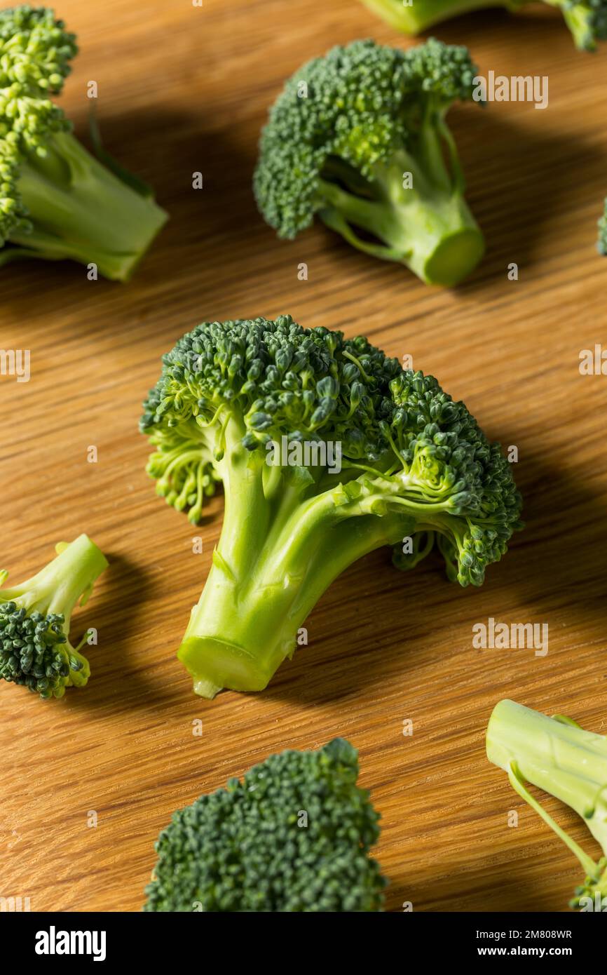 Raw Green Organic Broccoli Florets Ready to Cook Stock Photo - Alamy
