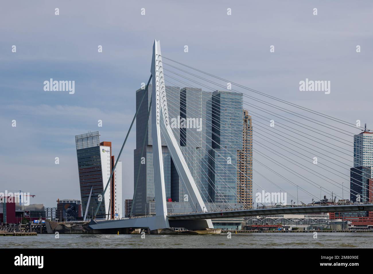 Outdoor sunny view of Erasmus Bridge, riverside of Nieuwe river and De ...