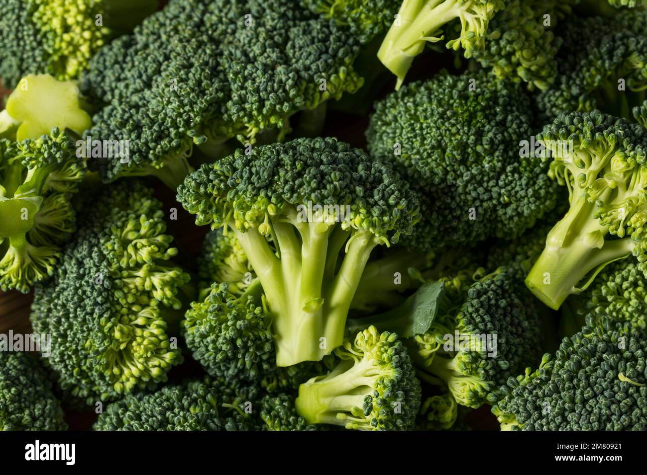 Raw Green Organic Broccoli Florets Ready to Cook Stock Photo - Alamy