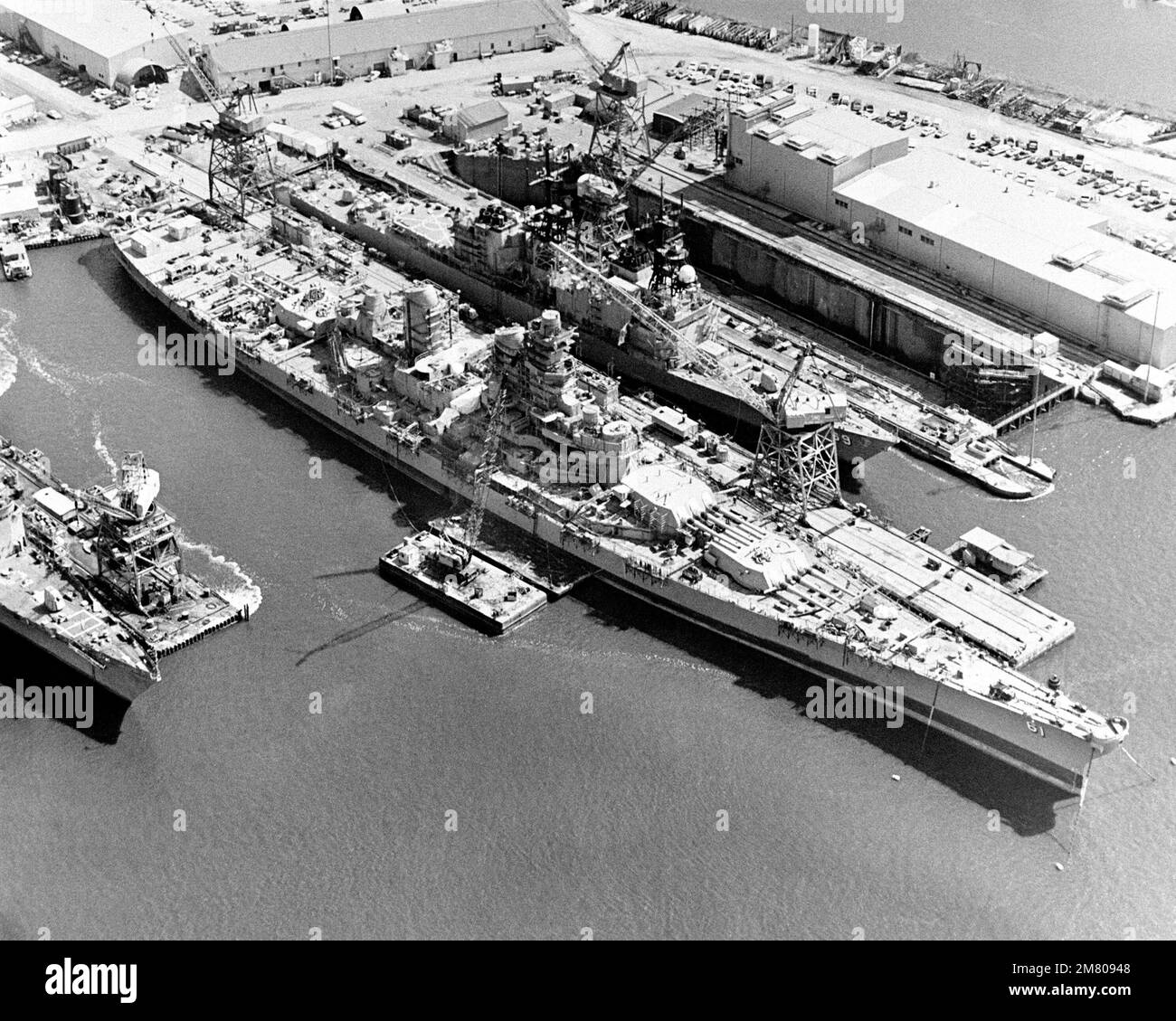 A view of the forward deck area, looking aft, aboard the battleship USS ...