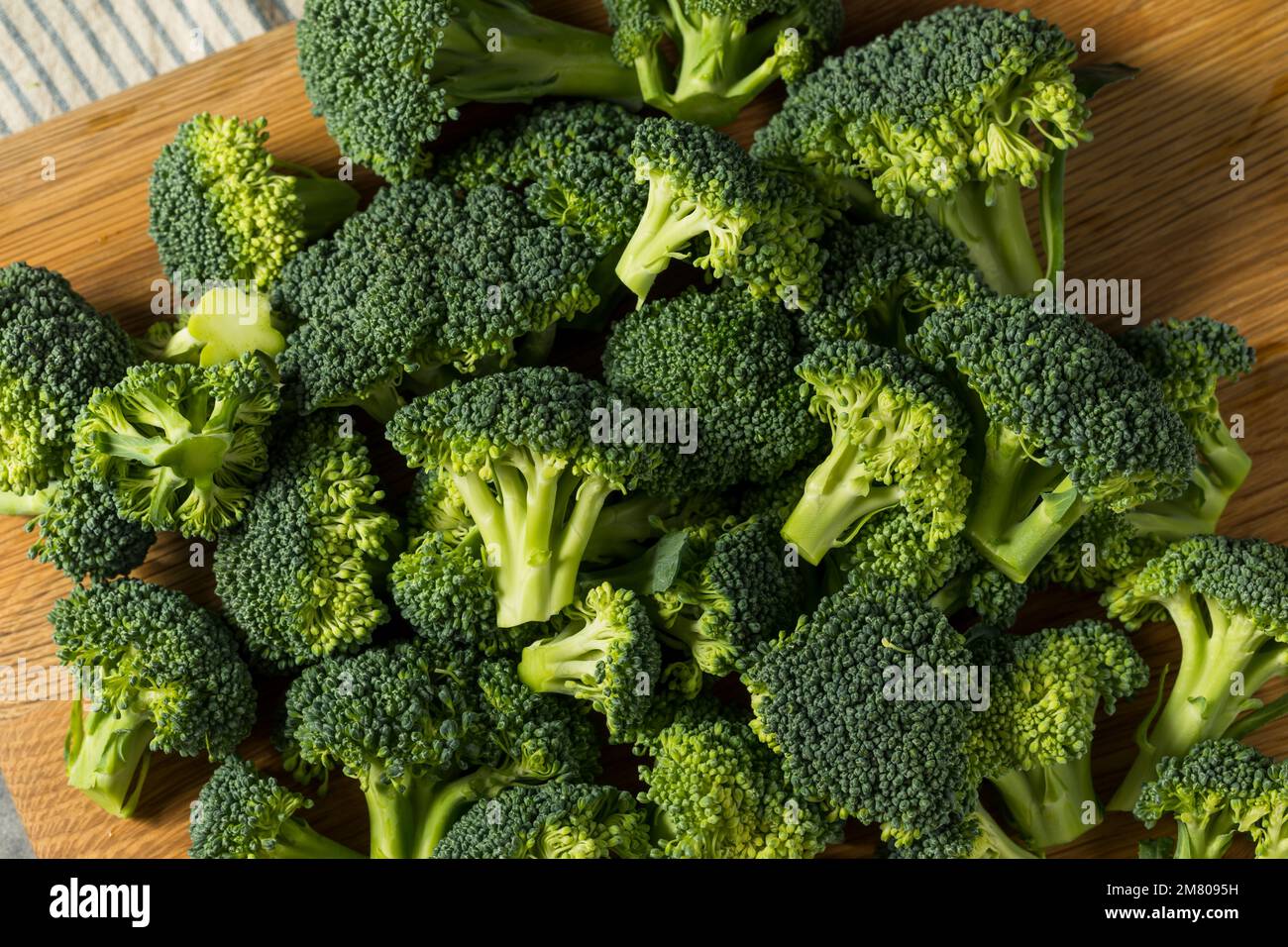 Raw Green Organic Broccoli Florets Ready to Cook Stock Photo - Alamy