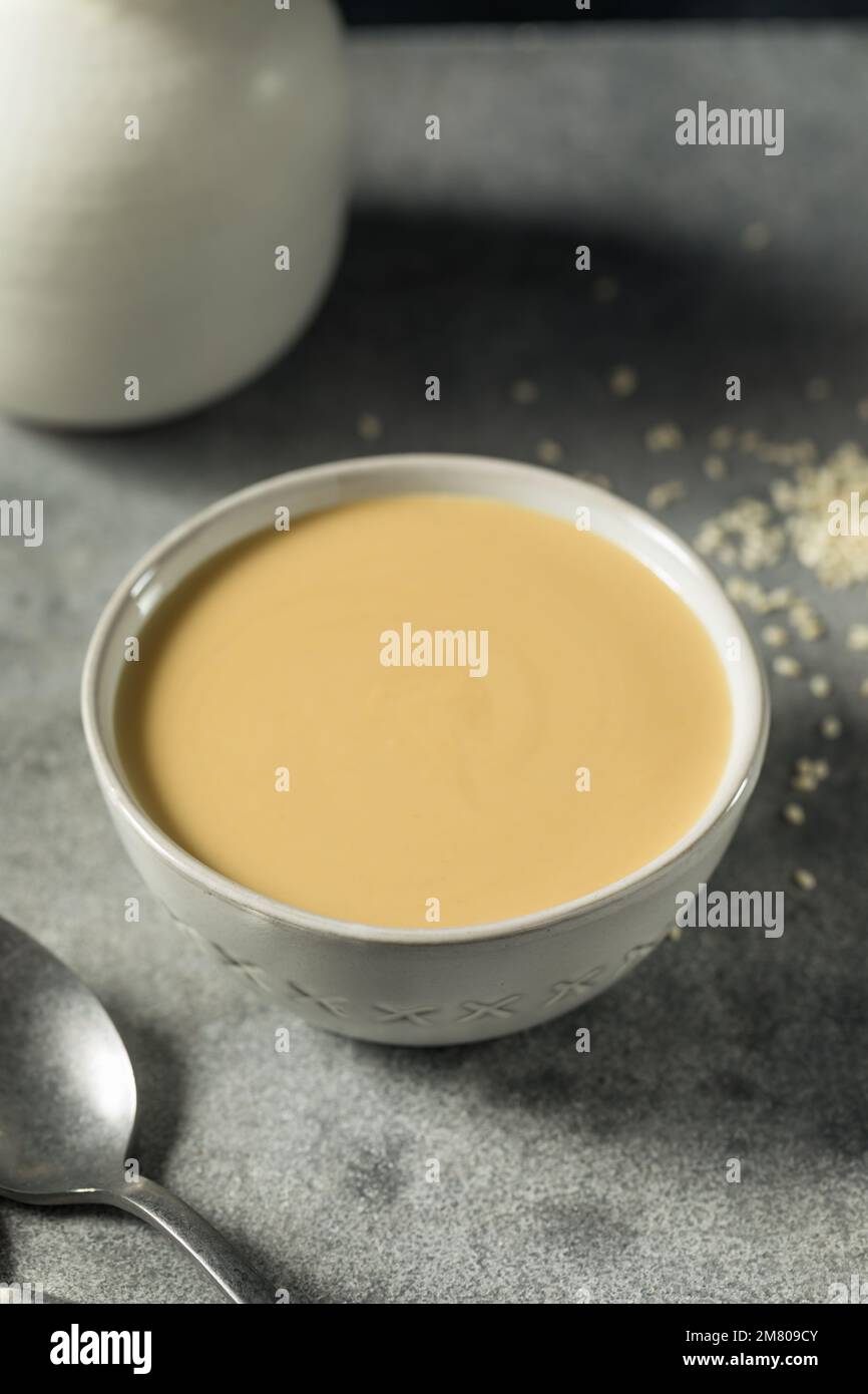 Homemade Organic Tahini Sesame Paste in a Bowl Stock Photo - Alamy