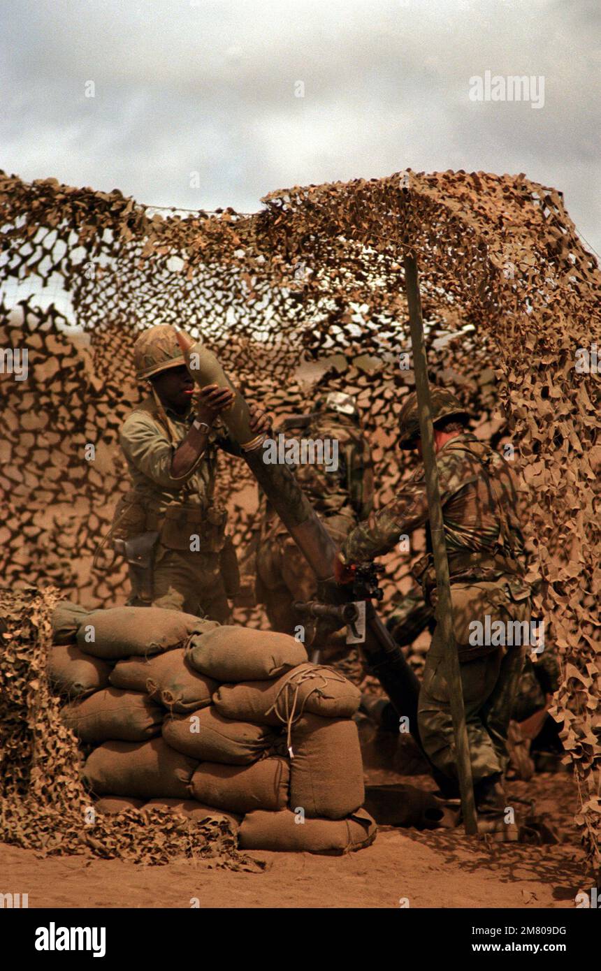 PFC James A. Williams, assistant gunner for a 4.2-inch motor section of ...
