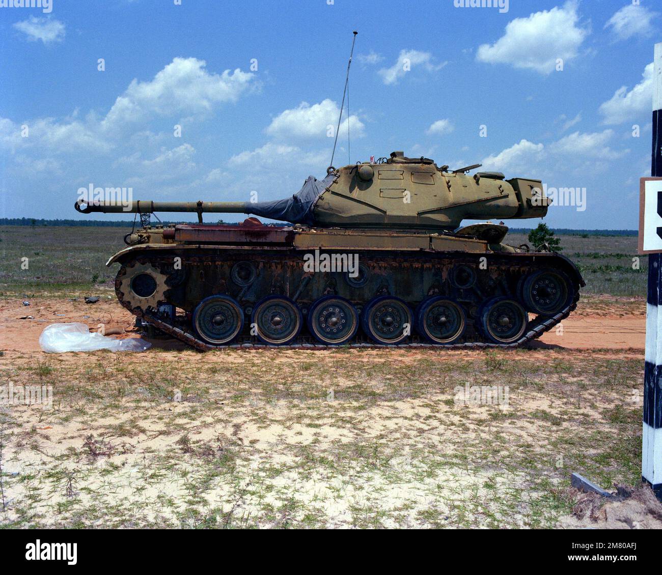 A left side view of a target tank prior to being hit by a Wasp missile ...