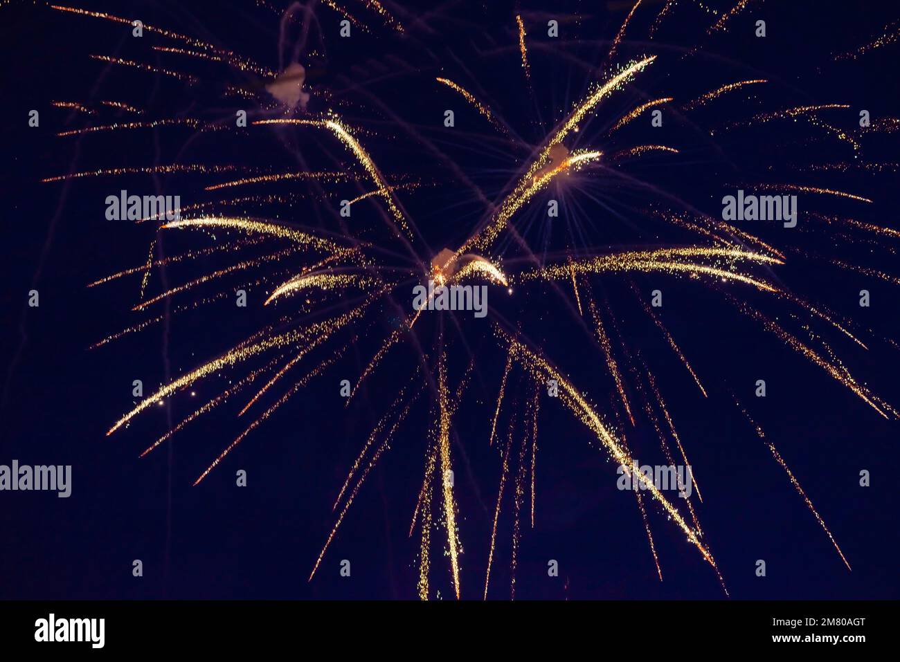 An explosion of bright single fireworks, against the background of the ...