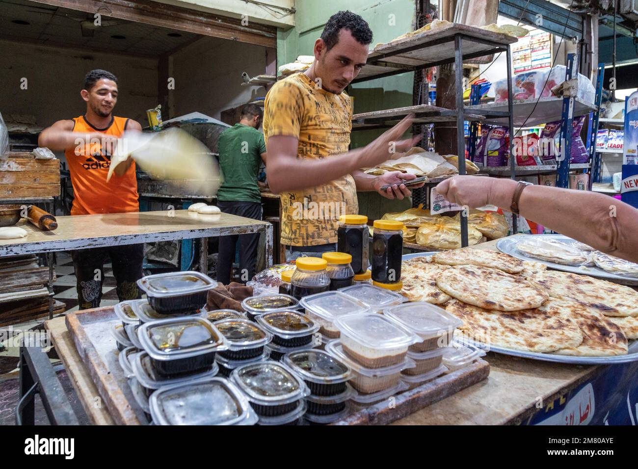 MAKING THE TRADITIONAL BALADI BREAD, EL DAHAR MARKET, POPULAR QUARTER ...