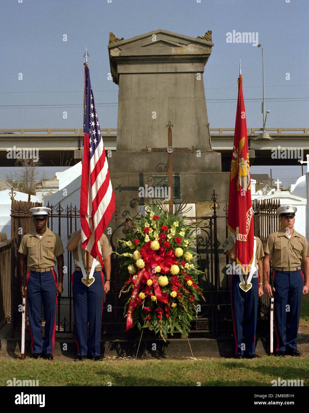 A color guard from the 4th Marine Division headquarters presents the ...