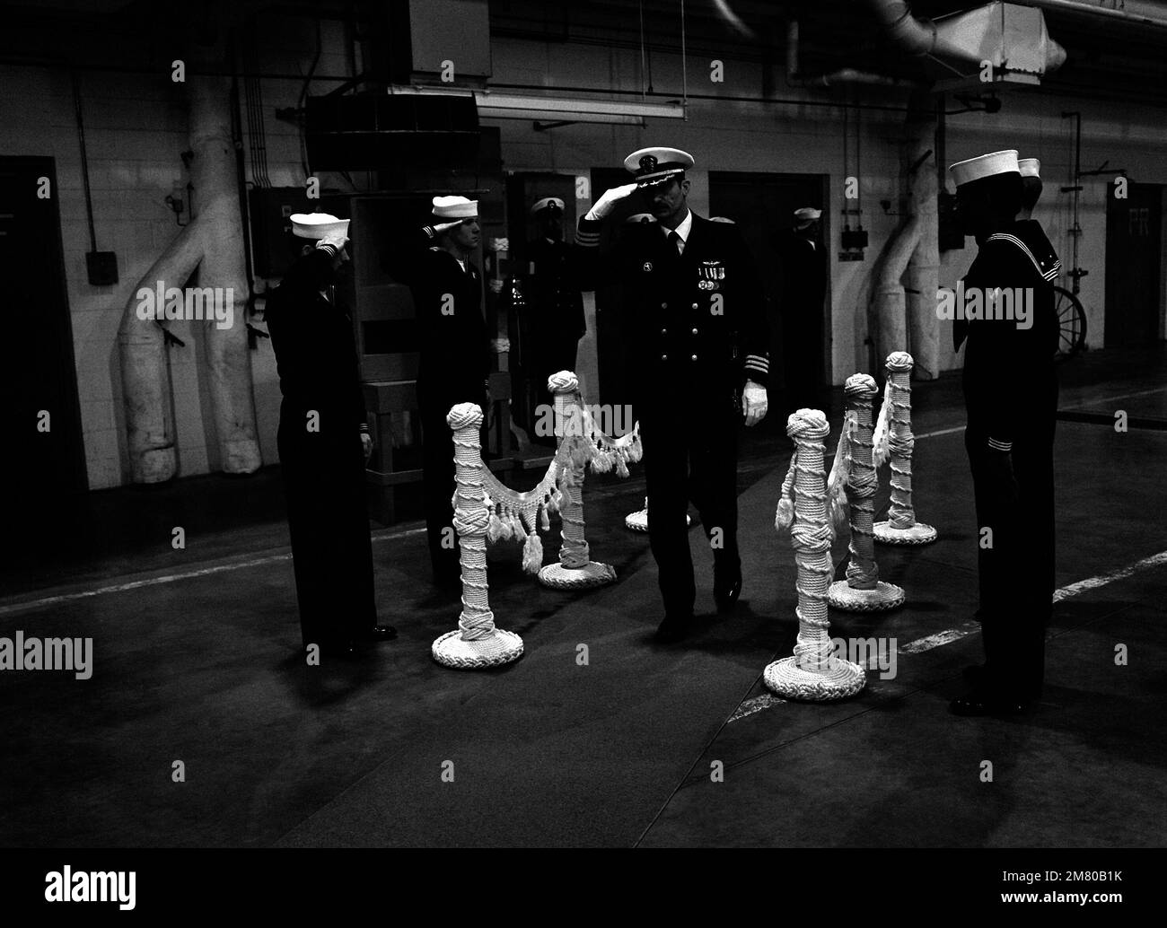 CDR Richard G. Simms is piped aboard during the change of command ...