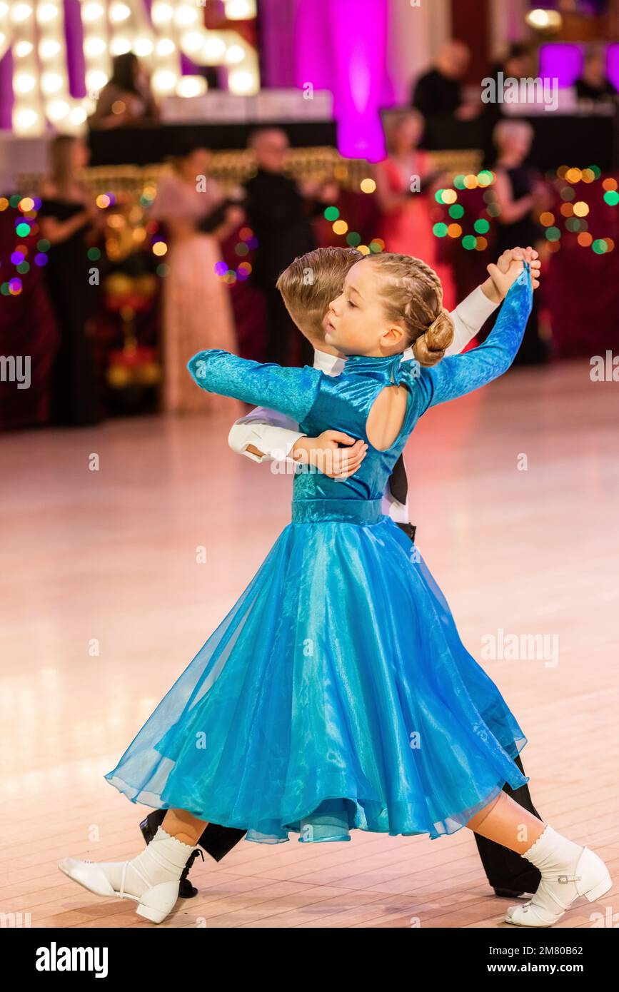 Attractive young couple of children dancing ballroom dance. Girl and ...