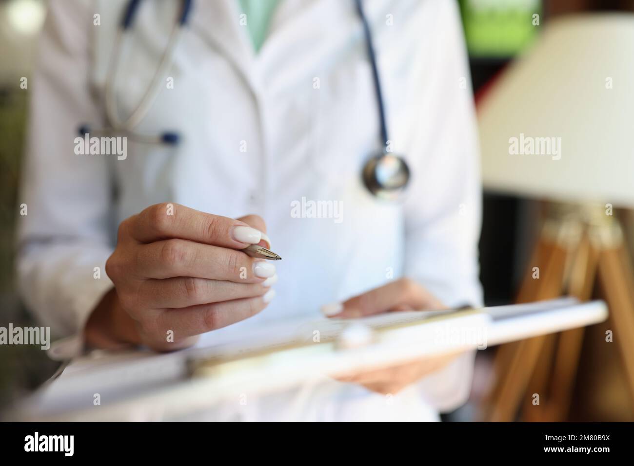 Female doctor working with medical forms and documents close-up Stock ...