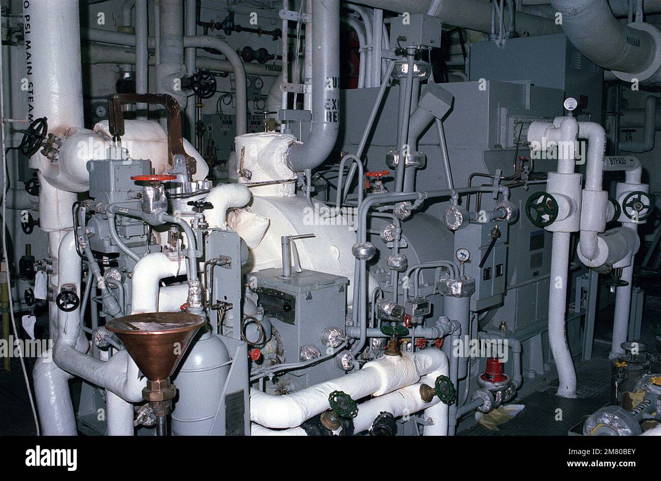 One of eight Ship's Service Turbo-Generators (SSTG) used to generate ...