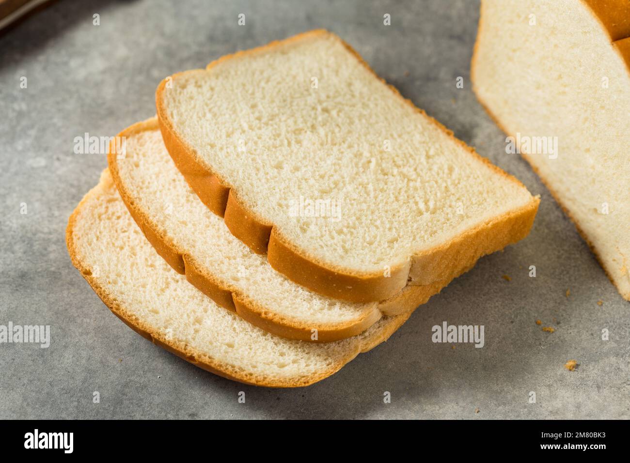 Organic Whole Wheat White Bread Cut into Slices Stock Photo - Alamy