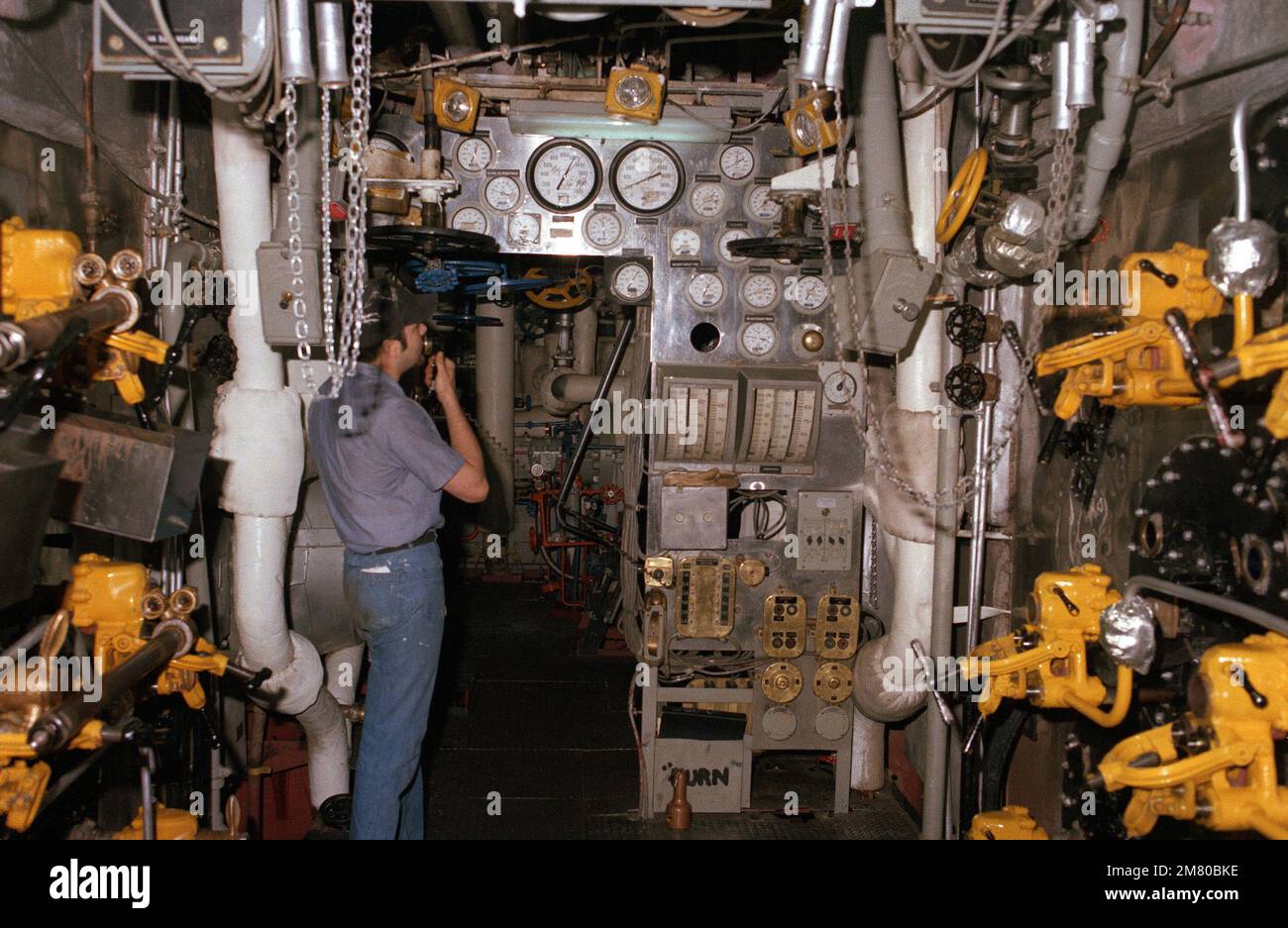 After lighting the boiler, gauges are monitored by a boilerman ...