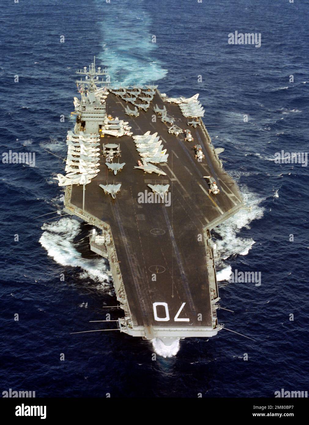 An aerial bow view of the nuclear-powered aircraft carrier USS CARL ...