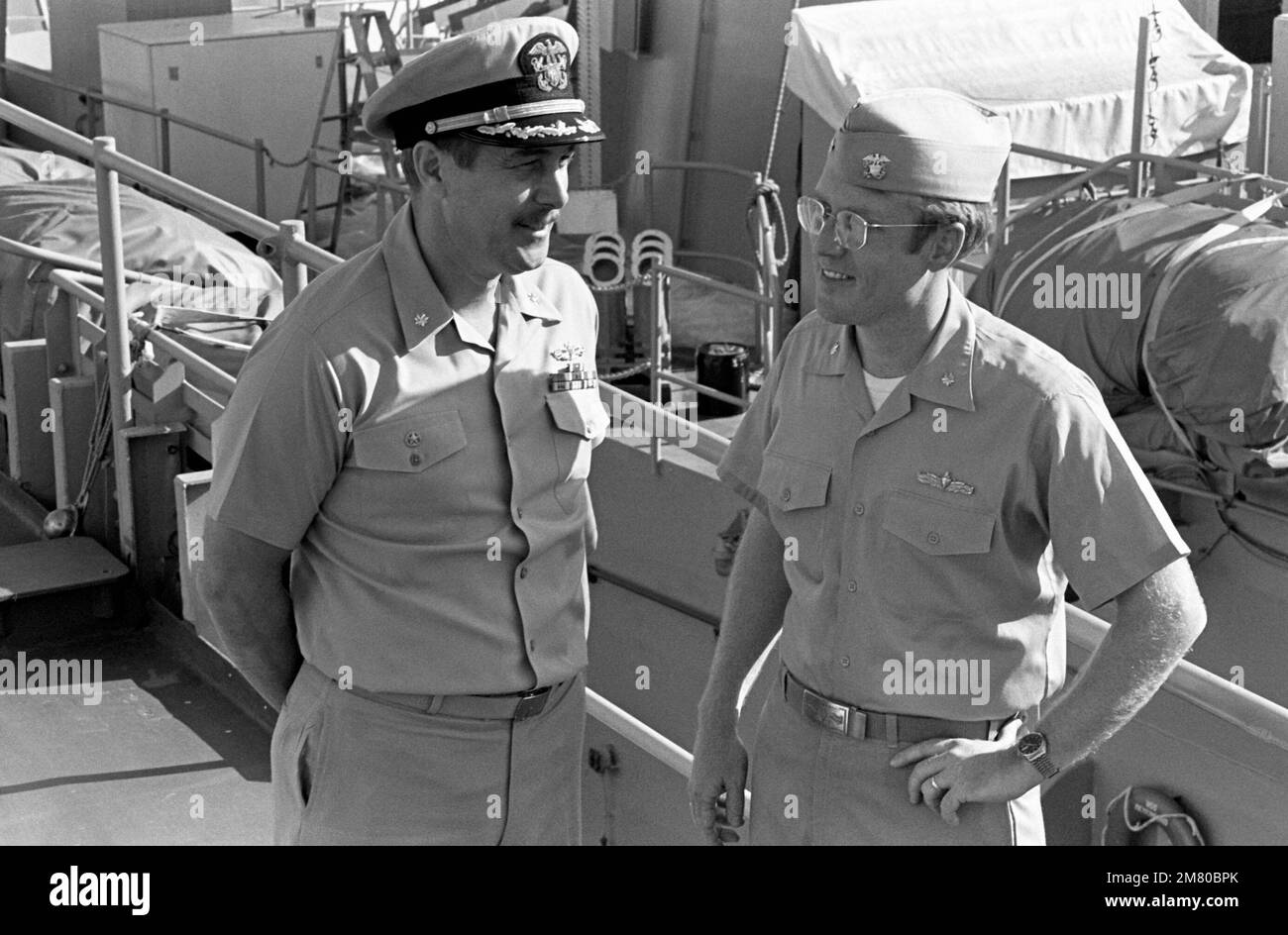 Commander George Coshow II, commanding officer of the frigate USS ...