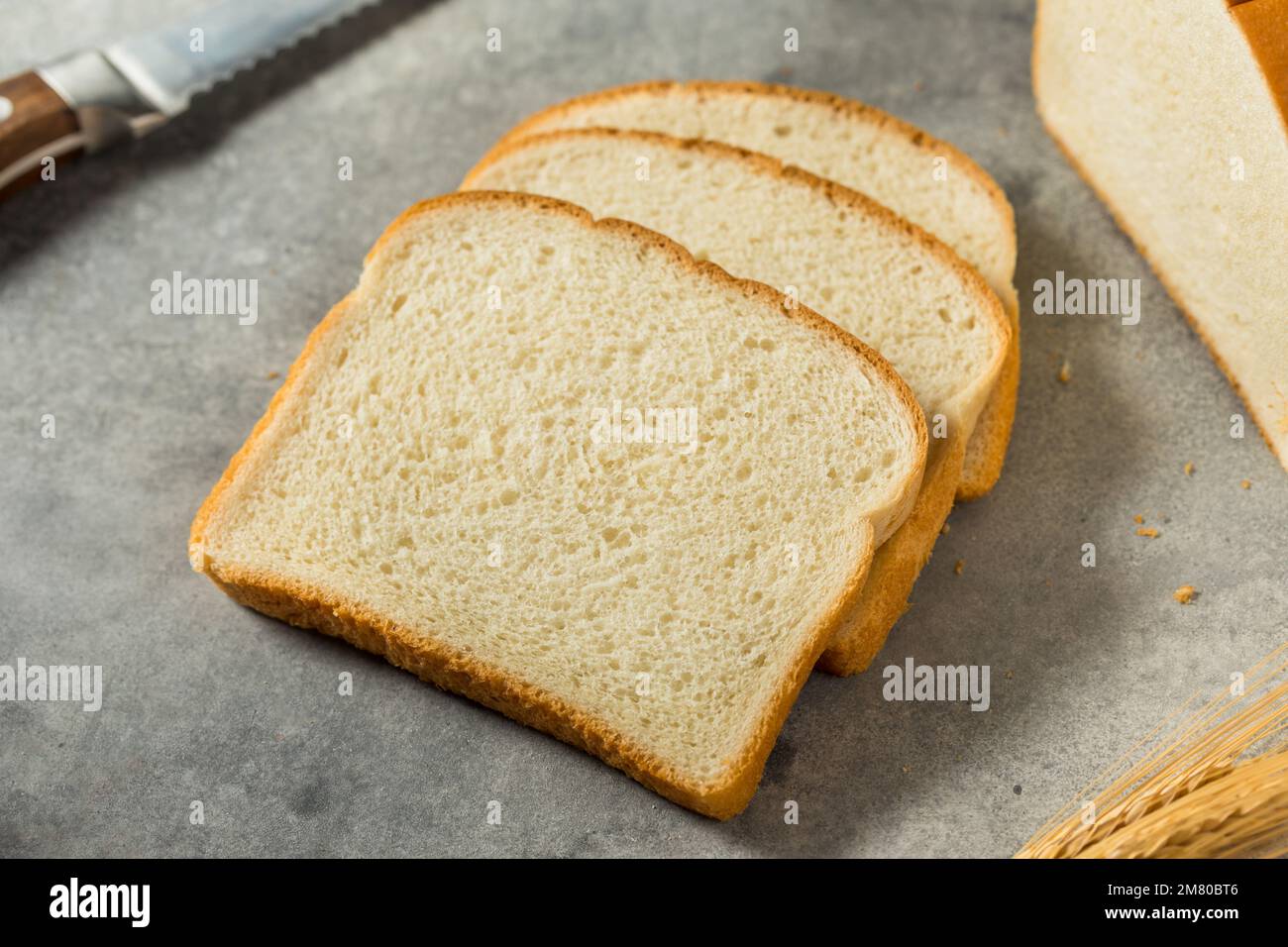 Organic Whole Wheat White Bread Cut into Slices Stock Photo - Alamy