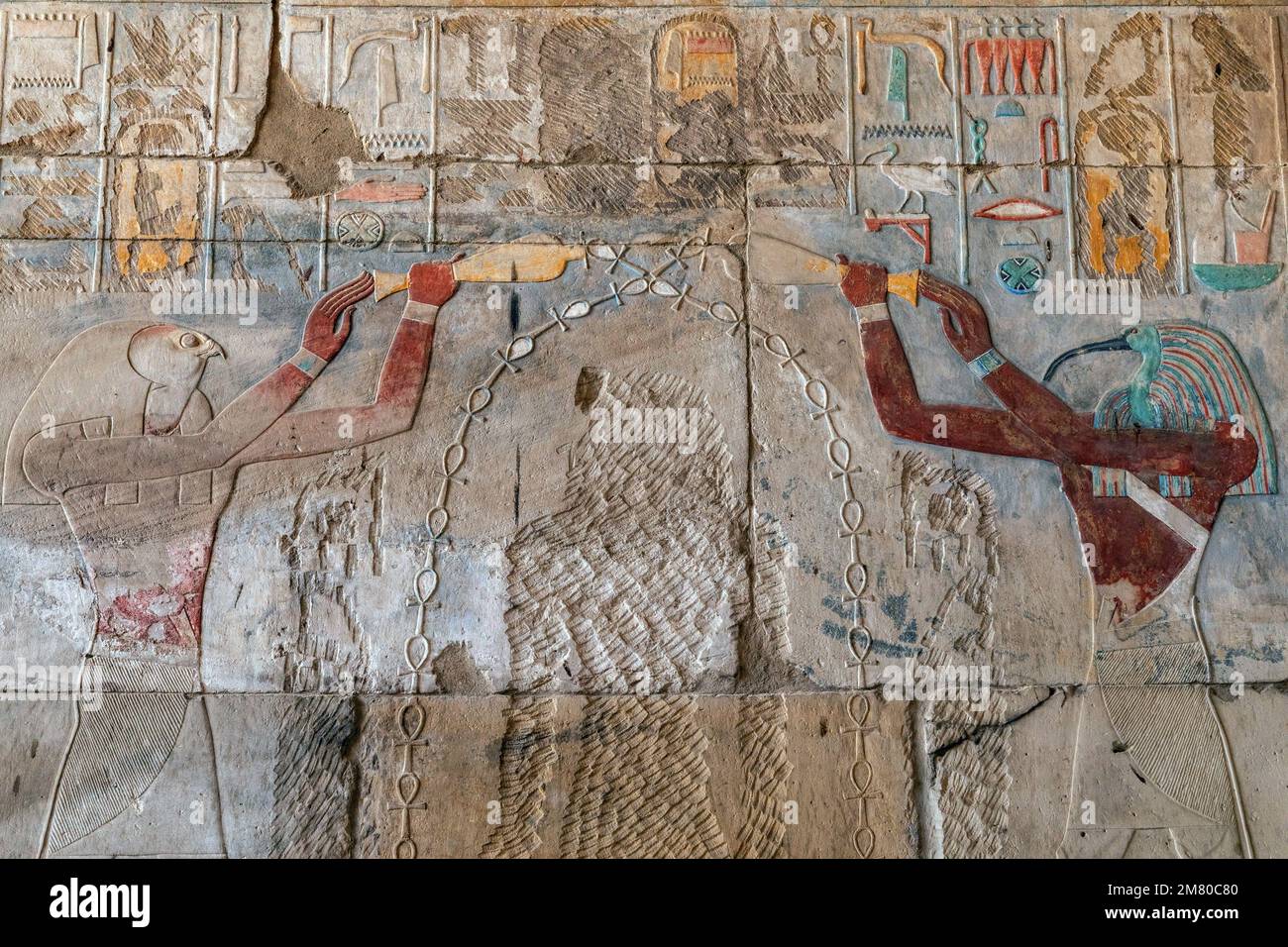 THE IBIS-HEADED GOD THOTH WITH THE FALCON-HEADED GOD HORUS PURIFYING ...