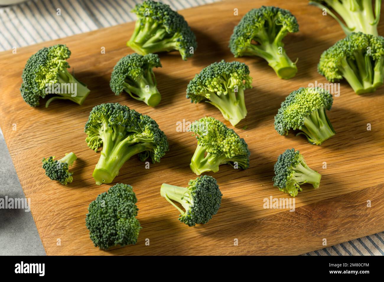 Raw Green Organic Broccoli Florets Ready to Cook Stock Photo - Alamy