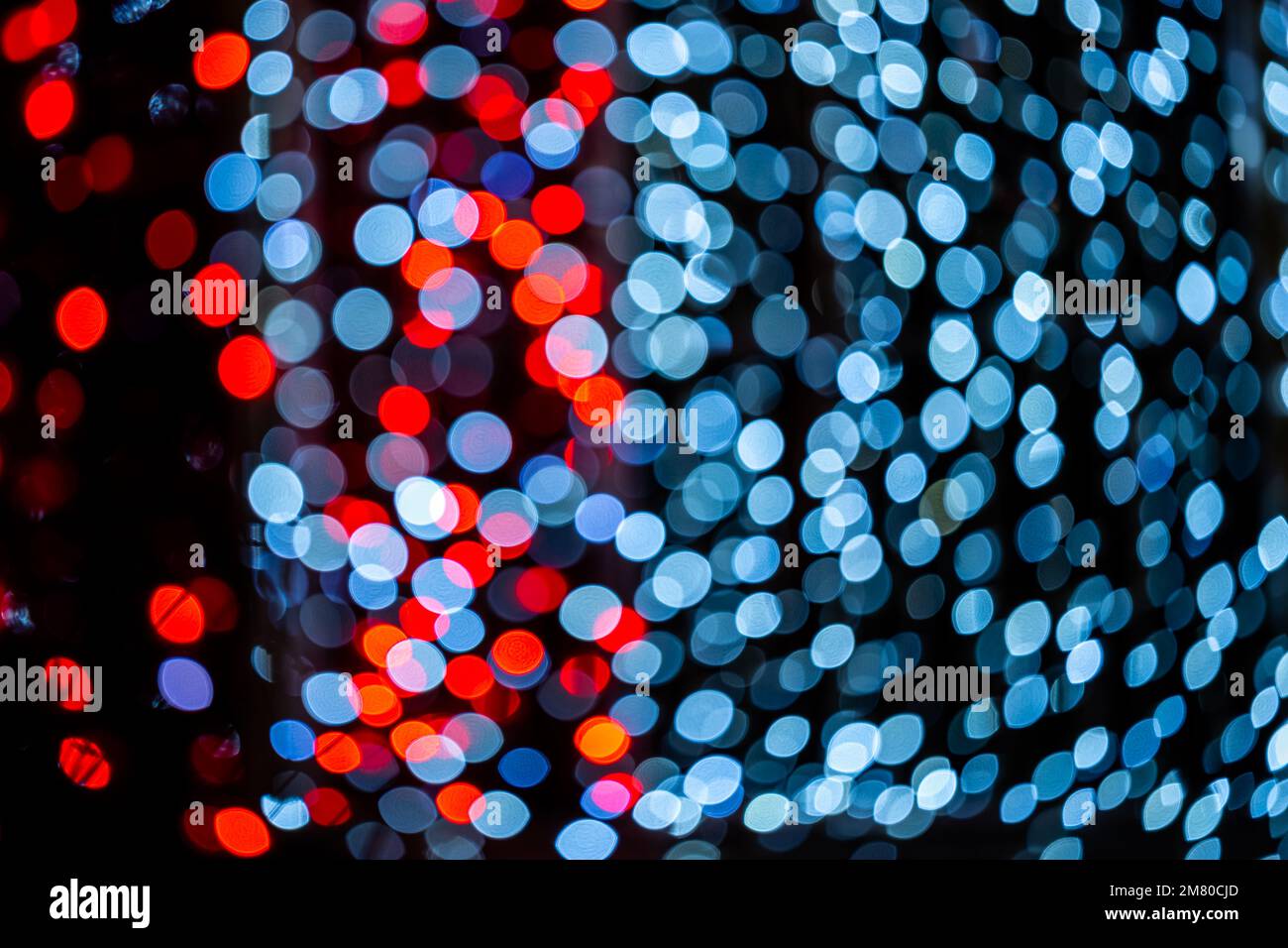 Blurred traces of lights and spots. Background full of unfocused ...