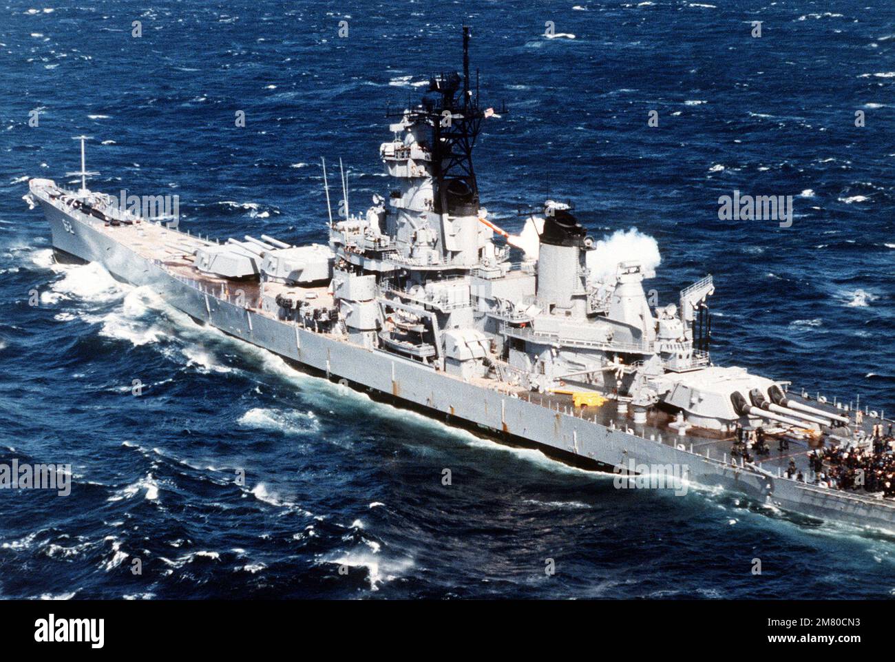 A port quarter view of the battleship USS NEW JERSEY (BB-62) underway ...