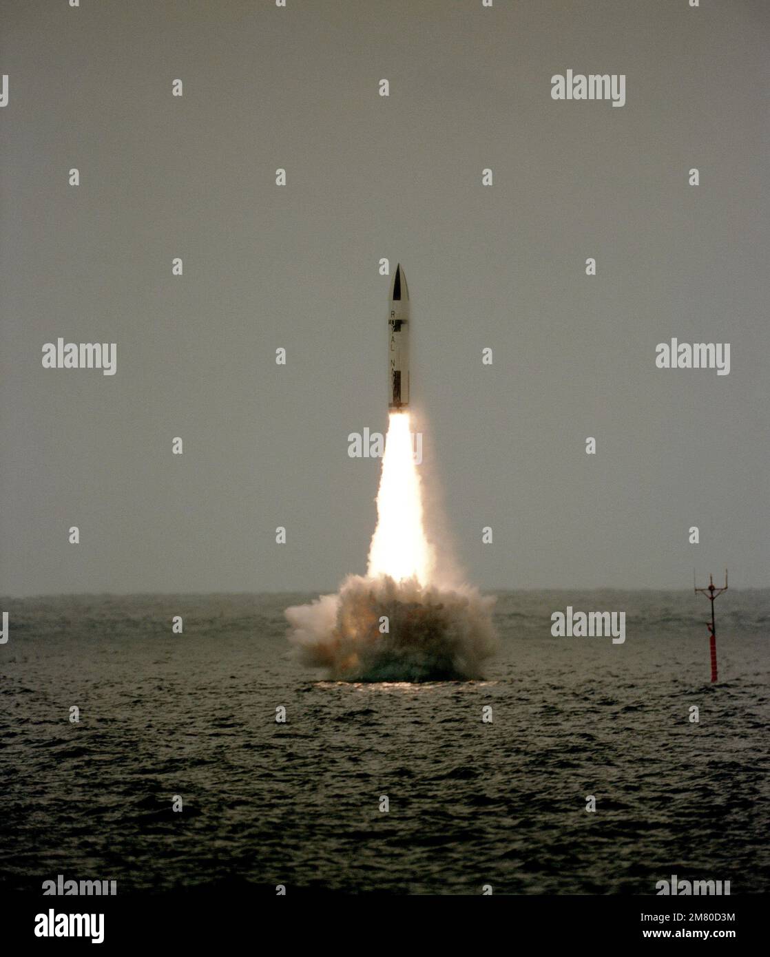 A Polaris missile lifts off after being fired from the submerged ...